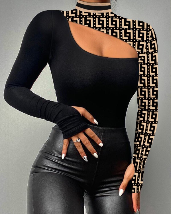 Haut à manches longues et découpes à imprimé géométrique